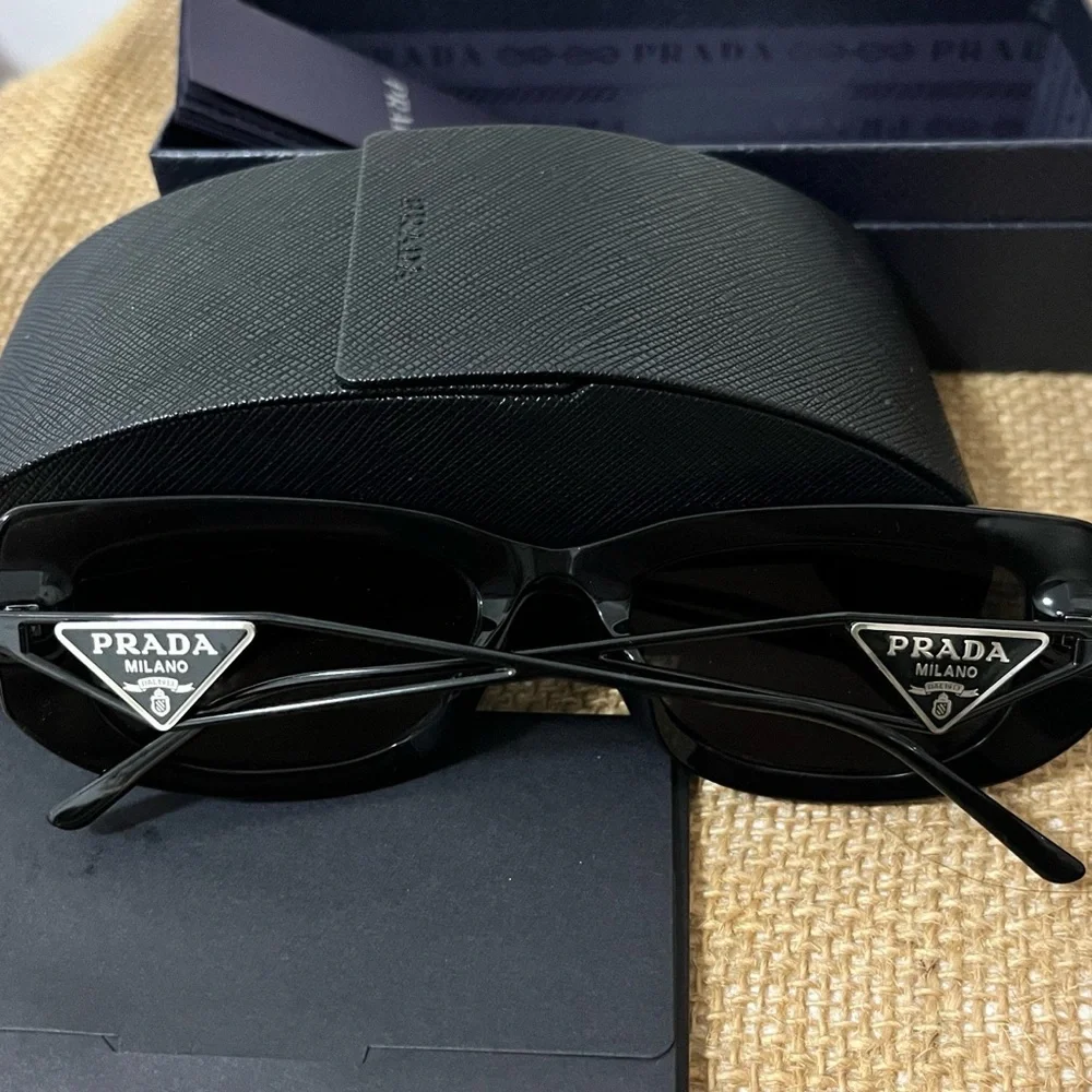 Prada | Accessories | Prada Black Oval Logo Sunglasses | Poshmark